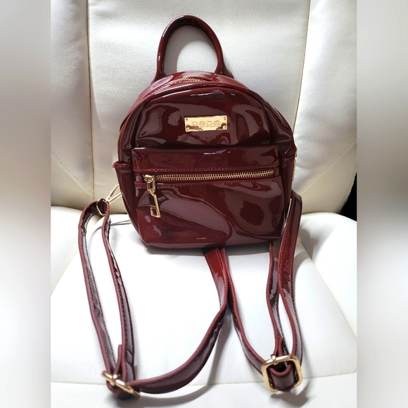 bebe | Bags | Bebe Mini Patent Leather Rich Burgundy Backpack | Poshmark